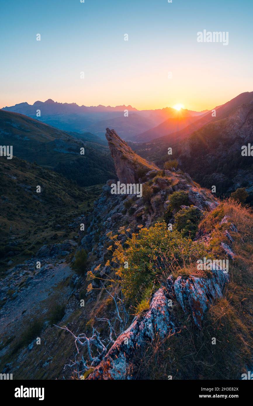 Tall mountain range of Pyrenees in highlands under majestic sky of wild ...