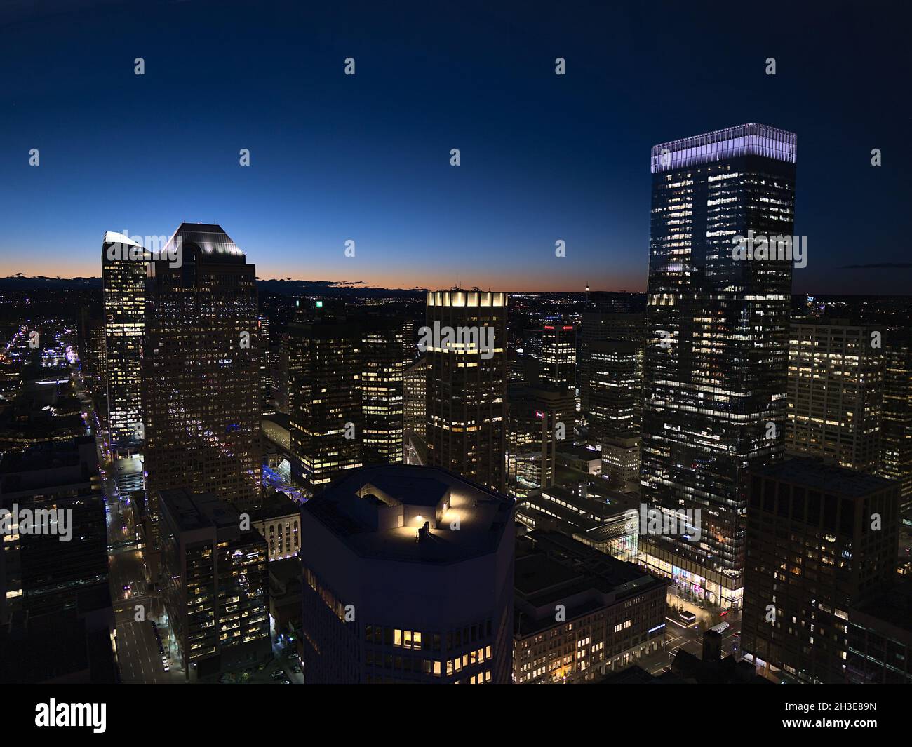 Beautiful view of Calgary skyline at night with modern office buildings ...