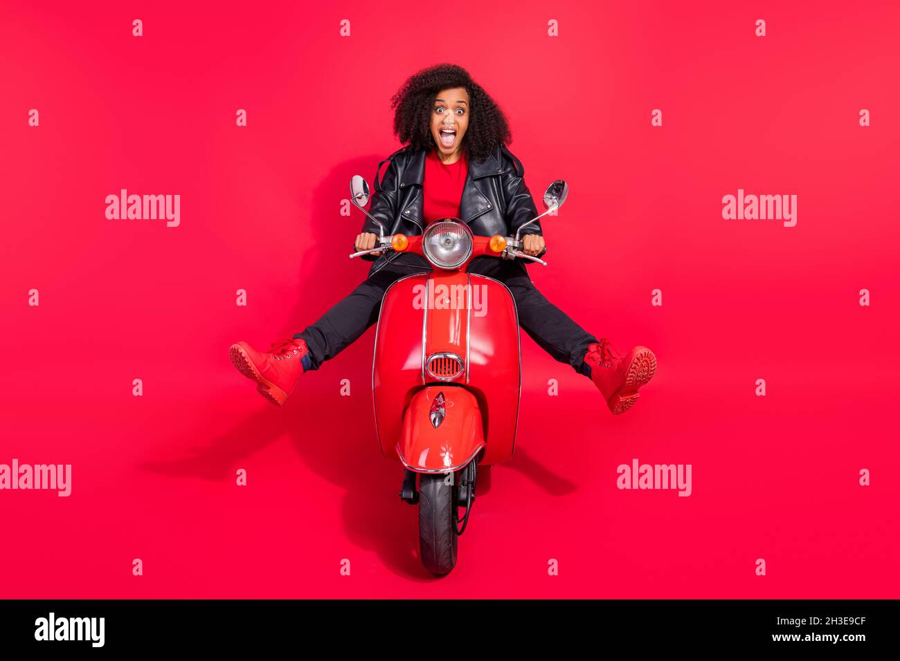 Full body of excited crazy attractive lady driving moped open mouth ...