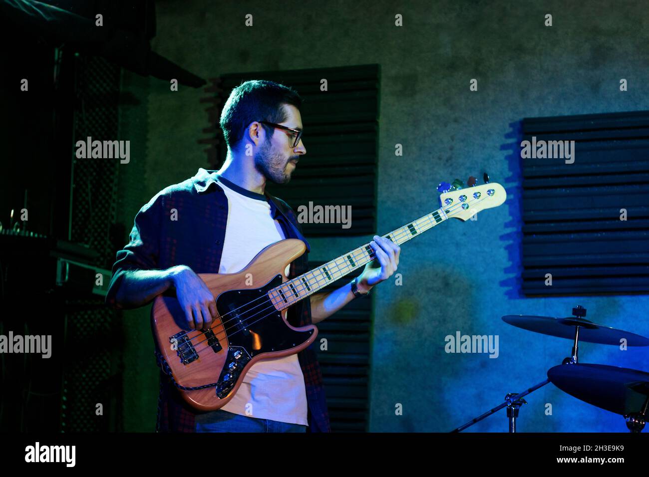Man playing bass guitar hi-res stock photography and images - Alamy
