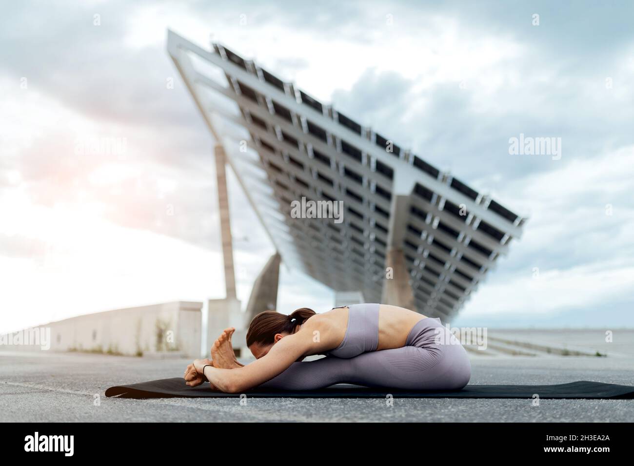 Seated forward fold hi-res stock photography and images - Alamy