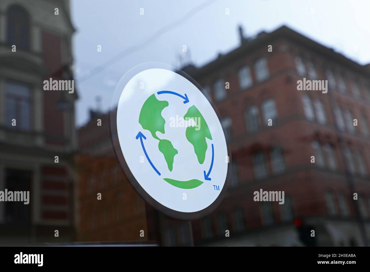 Signs in the storefront at a Samsonite store, in Stockholm. A green ...