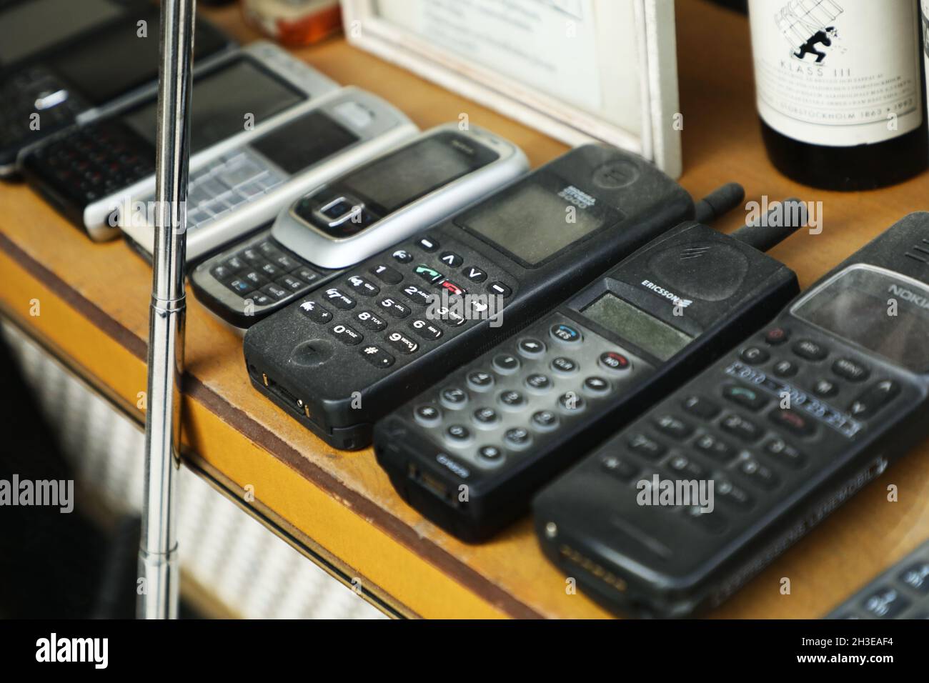 Old cell phones in a storefront, in Stockholm, Sweden Stock Photo - Alamy