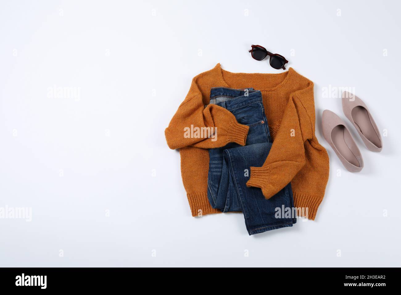 Autumn style clothes on white background, top view Stock Photo - Alamy