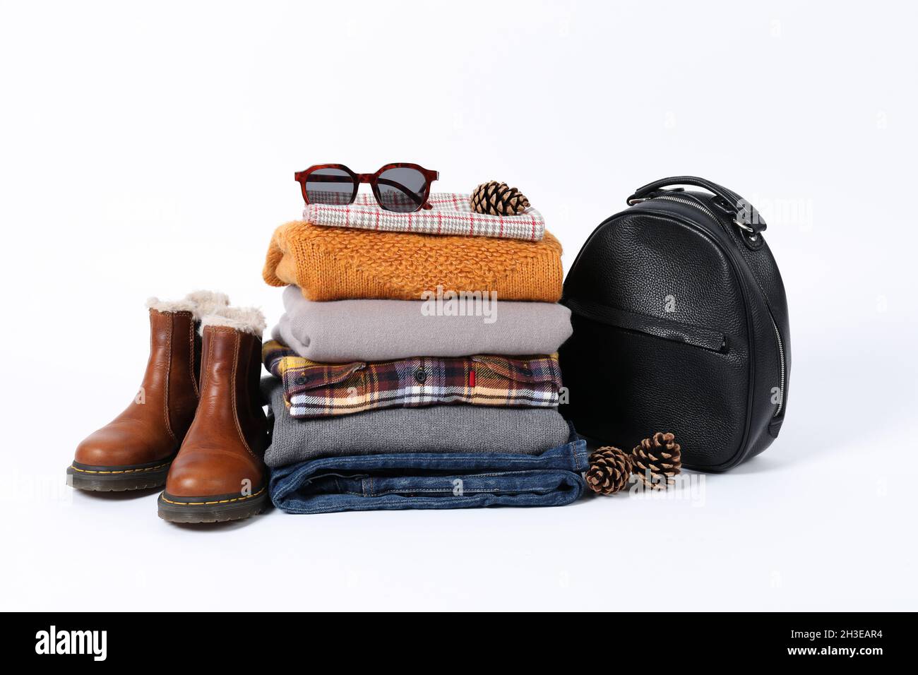 Concept of winter clothes isolated on white background Stock Photo - Alamy