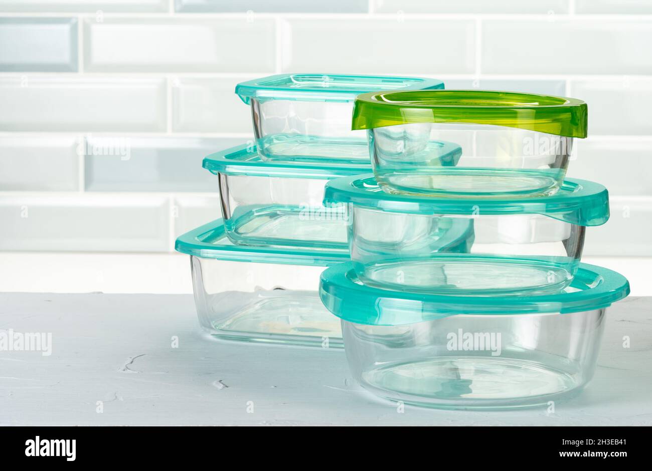 Set of plastic boxes kitchen ware on kitchen counter Stock Photo - Alamy