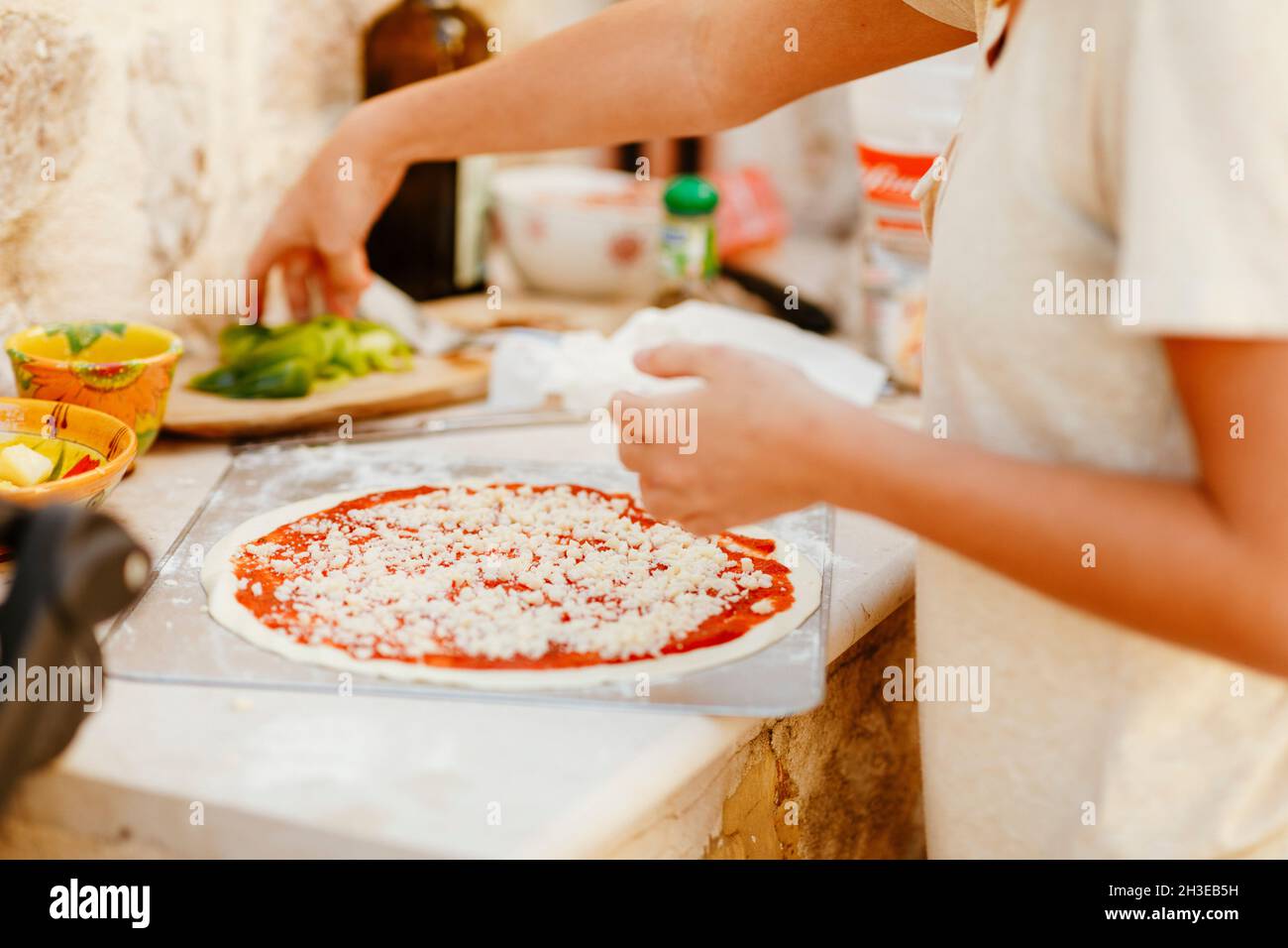 Homemade pizza baking with outdoor traditional pizza over Stock Photo ...