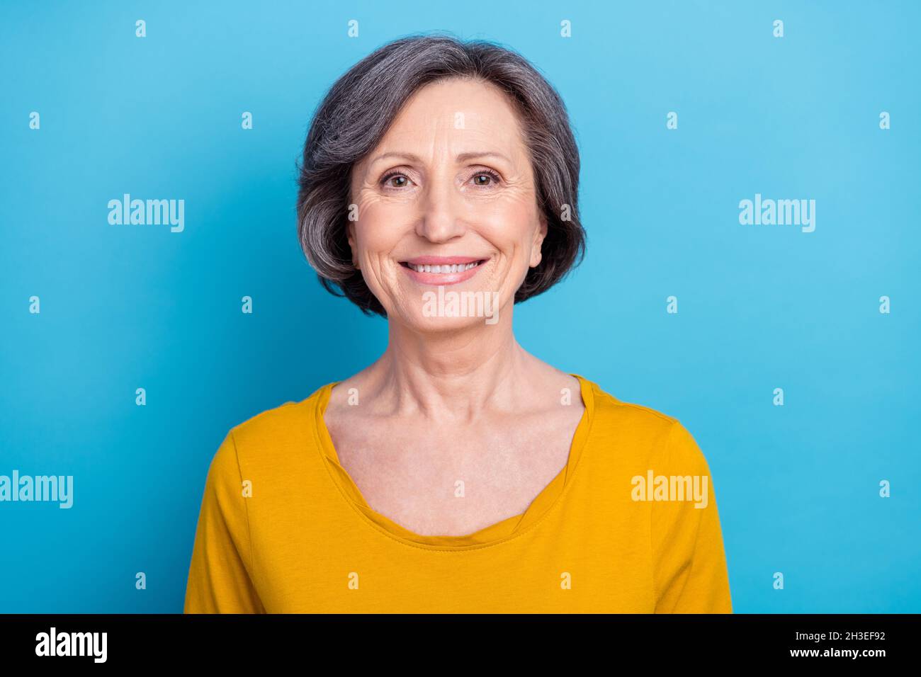 Portrait of attractive cheerful middle-aged content wise woman isolated ...