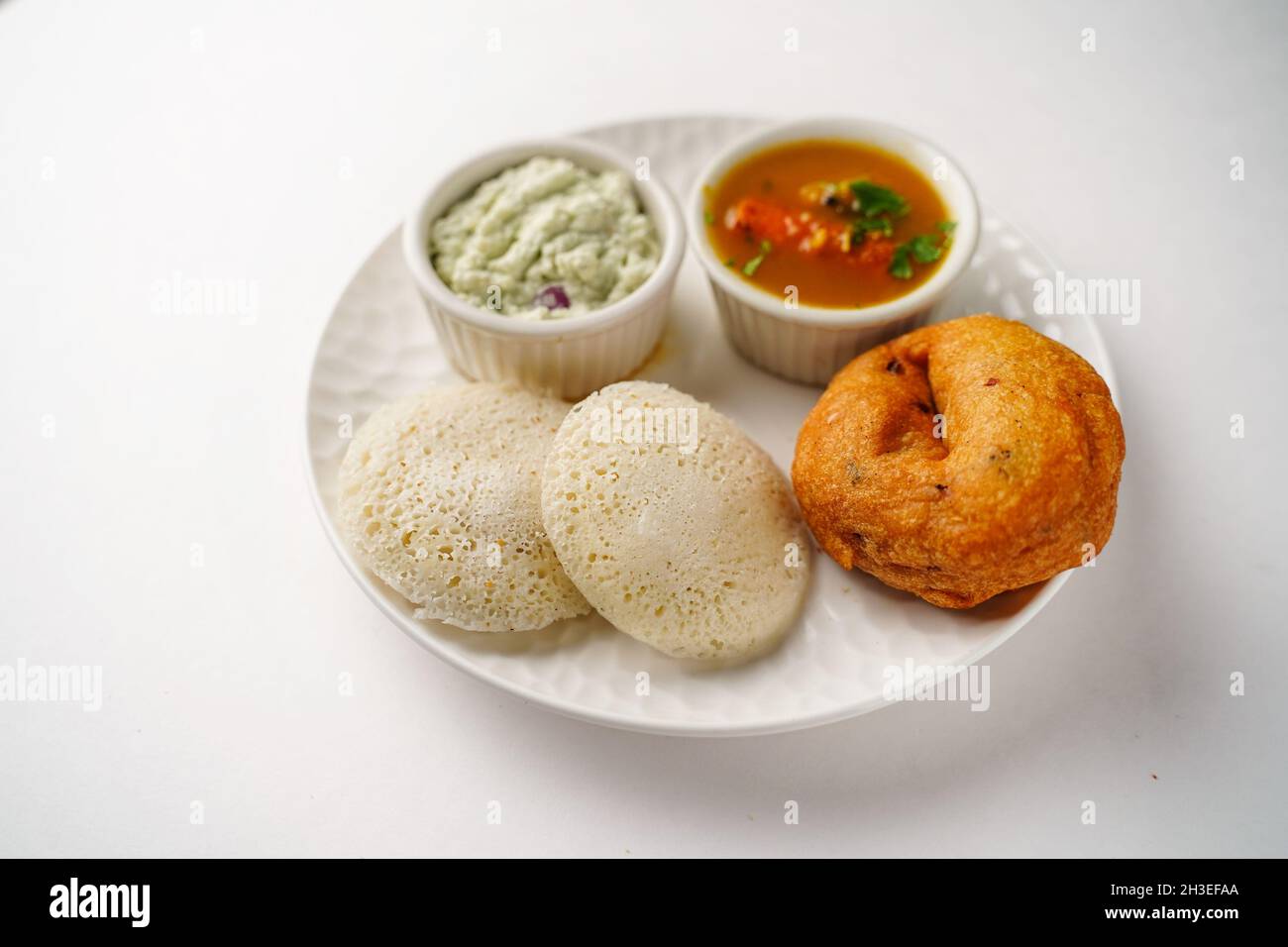 Idli Vada sambar chutney isolated on white - South Indian vegetarian ...