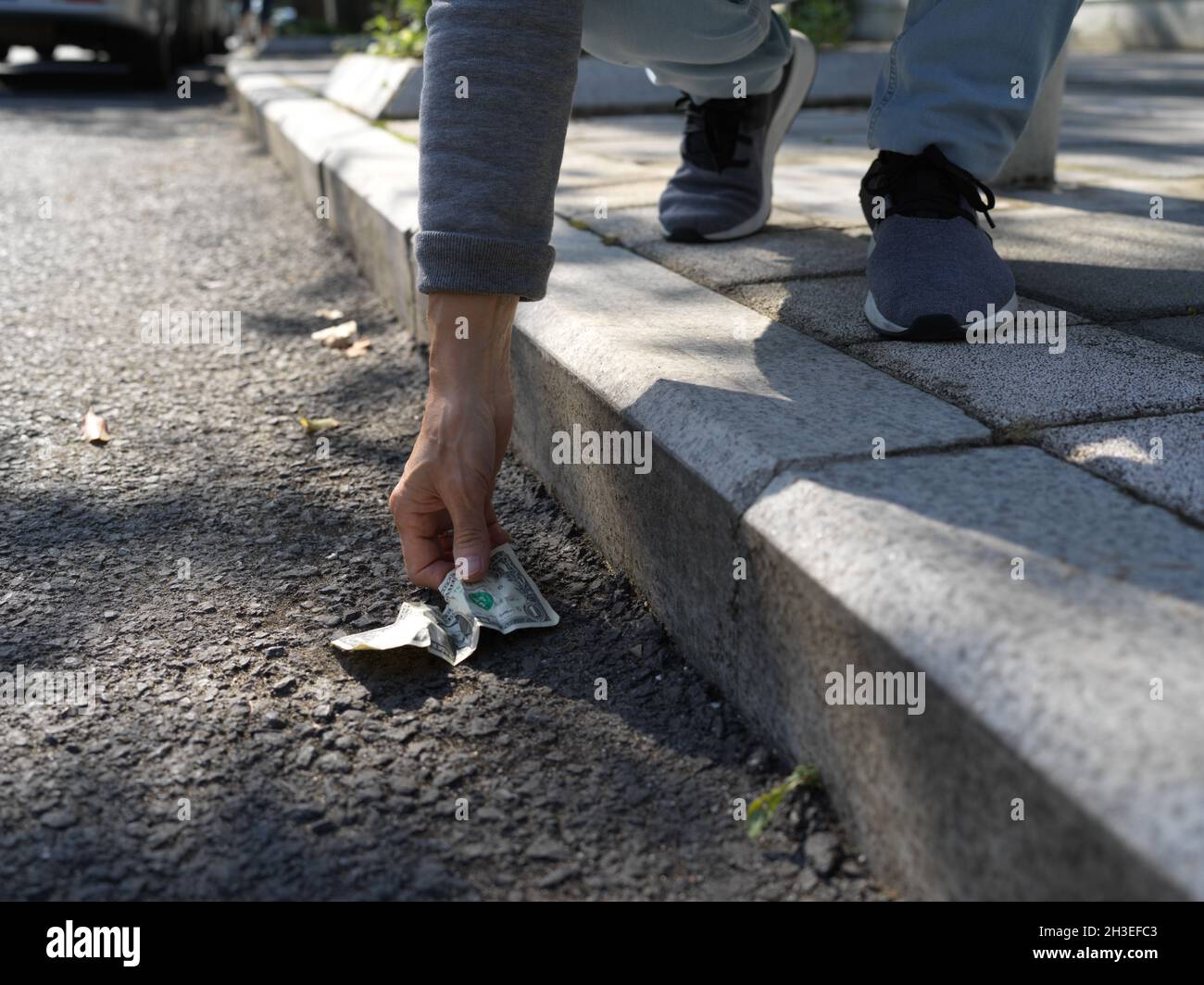 Finding coins hi-res stock photography and images - Alamy