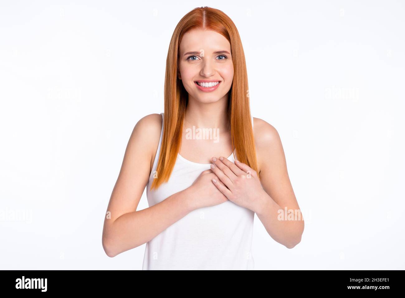Photo of positive nice red hairdo lady wear white top hands heart ...