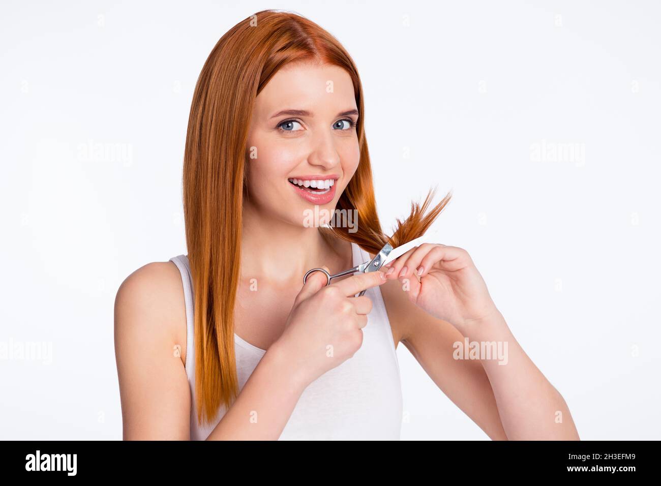 Photo of young attractive girl happy positive smile cut scissors red ...