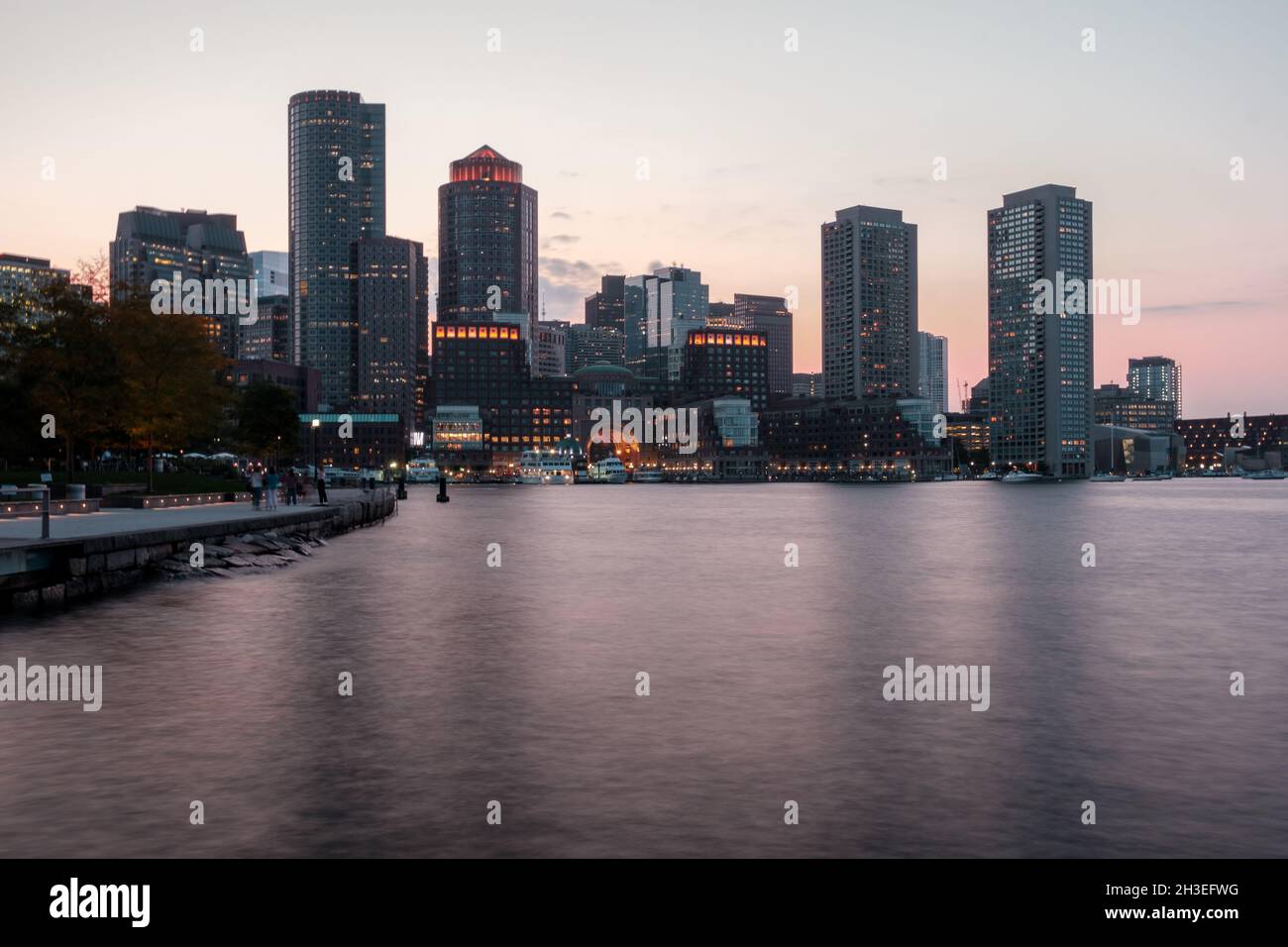 Boston skyline at sunset, located in Fan Pier Park, Boston ...