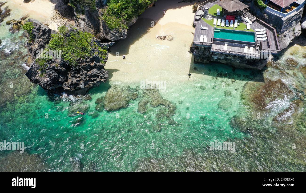 View from above rocks lounge on the cliff blend with blue sea in ...