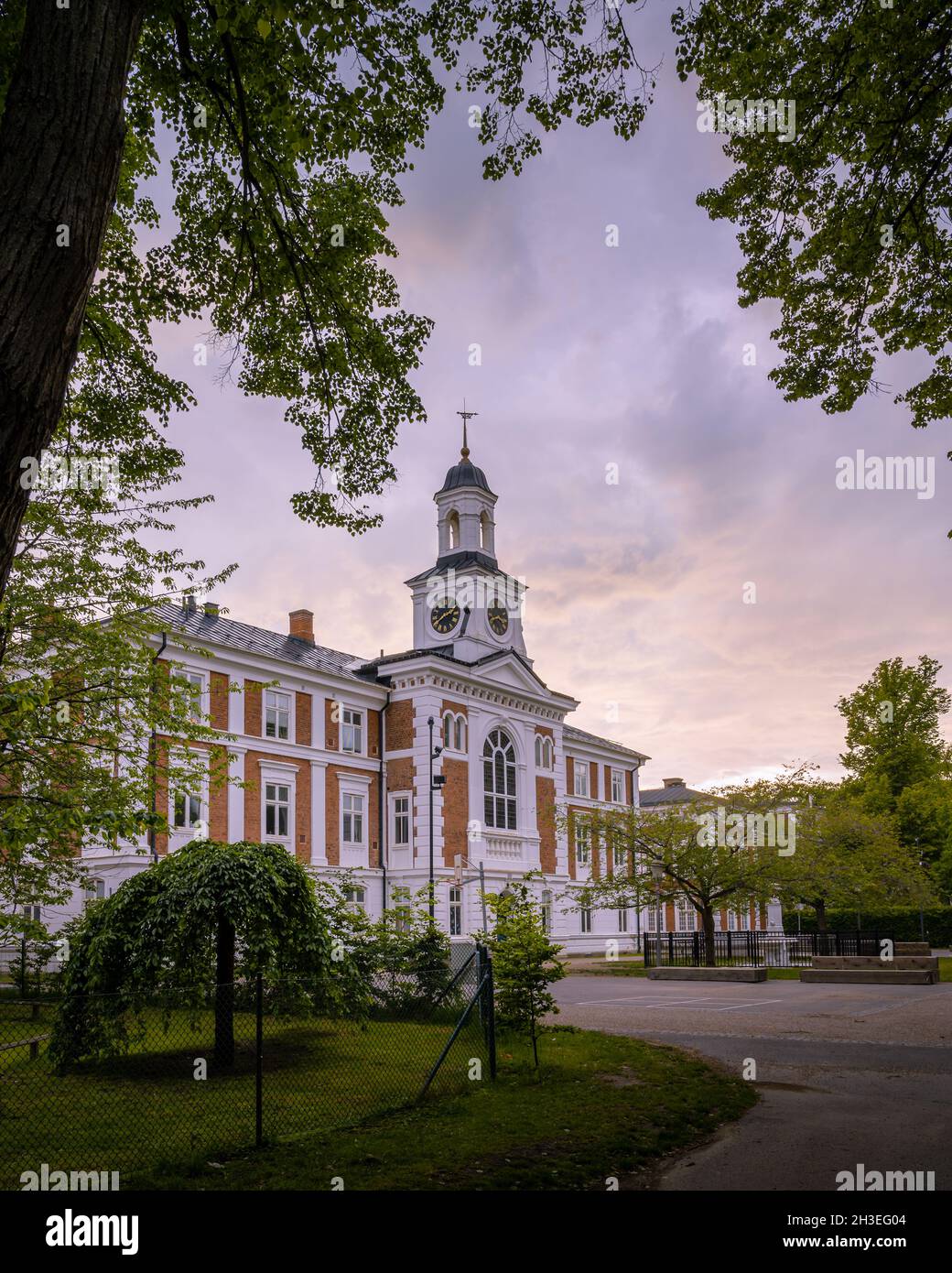 Old historic asylum building converted into a school in public park in ...
