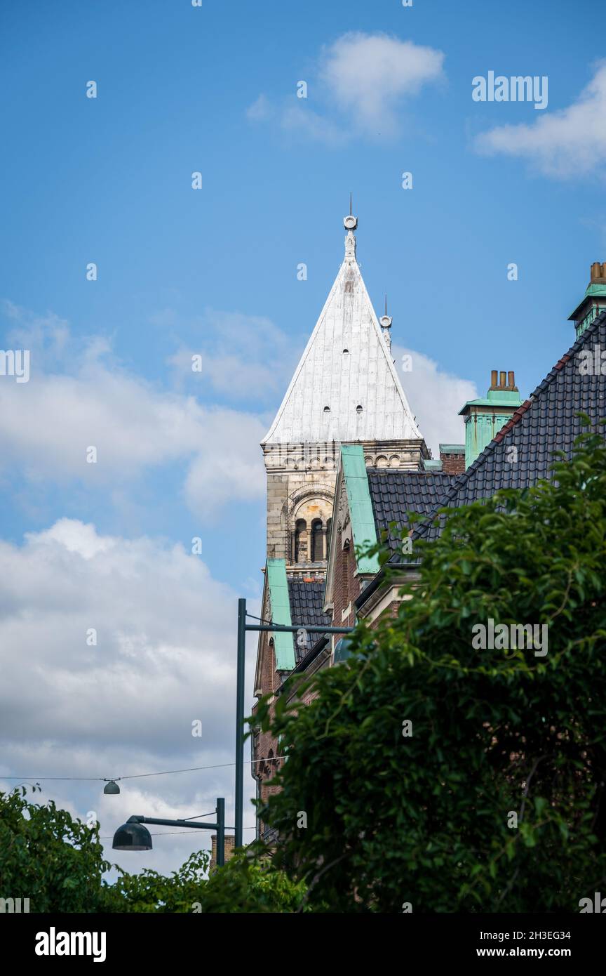 The towers of Lund cathedral on summer day against blue sky Stock Photo ...