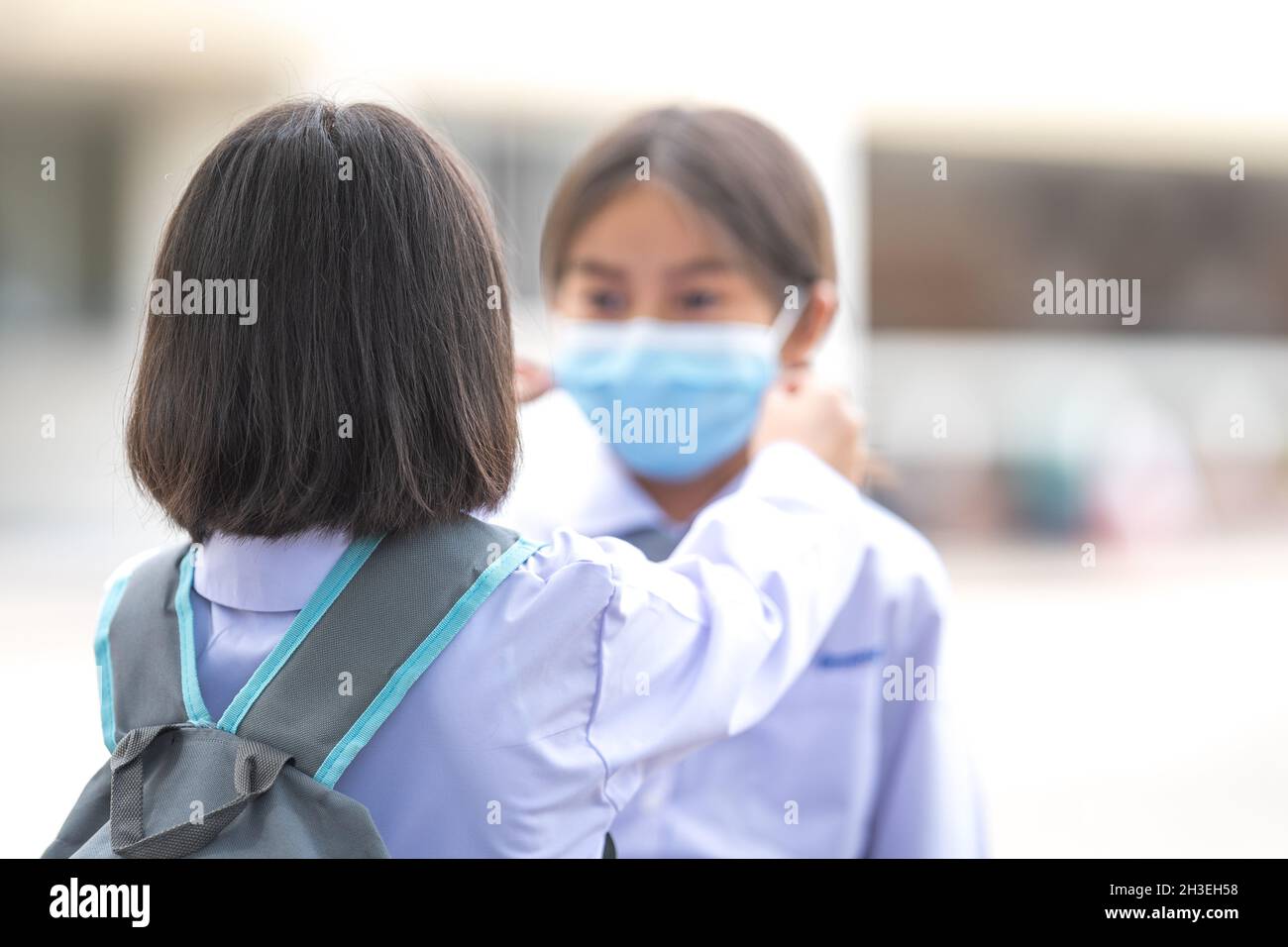 Helping a friend kids hi-res stock photography and images - Alamy