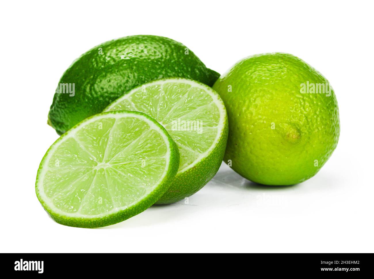 Pieces of lime isolated on white background Stock Photo - Alamy