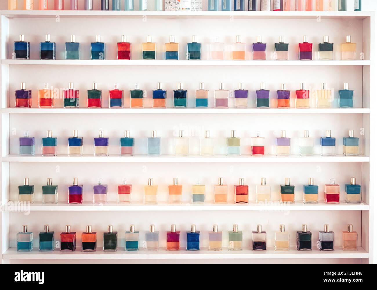 Group of color glass cosmetic bottles Stock Photo - Alamy