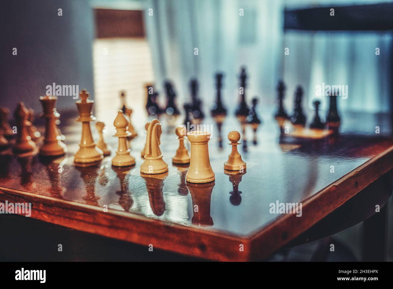 colorful chess figureson a blurred background Stock Photo - Alamy