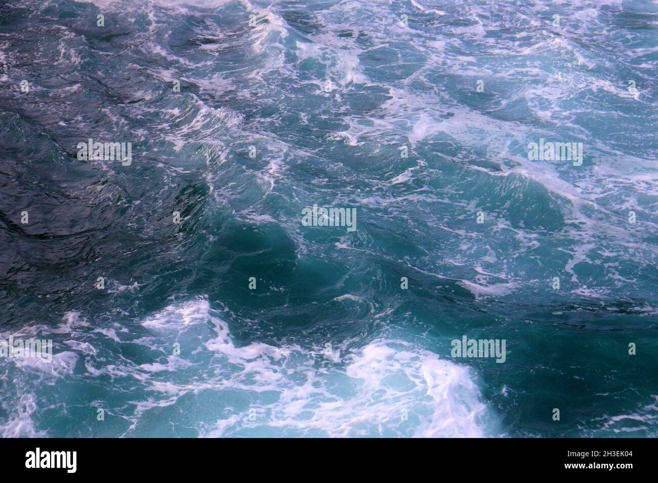 Stunning splashing waves. Foamy ocean water. Water droplets and waves ...