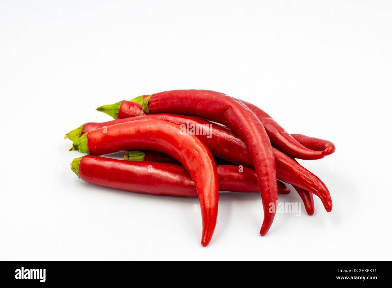 Red hot chili pepper on white background with shadow. close up Stock ...