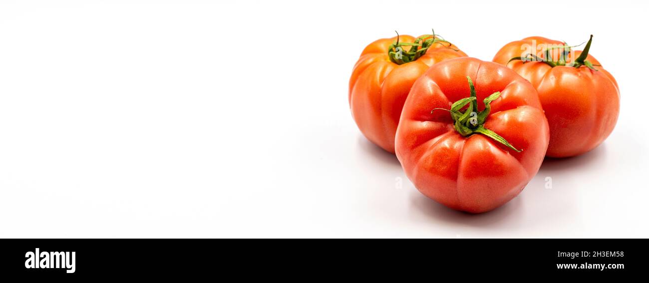 Red Beef Tomato isolated on white background with shadow. Copy space ...