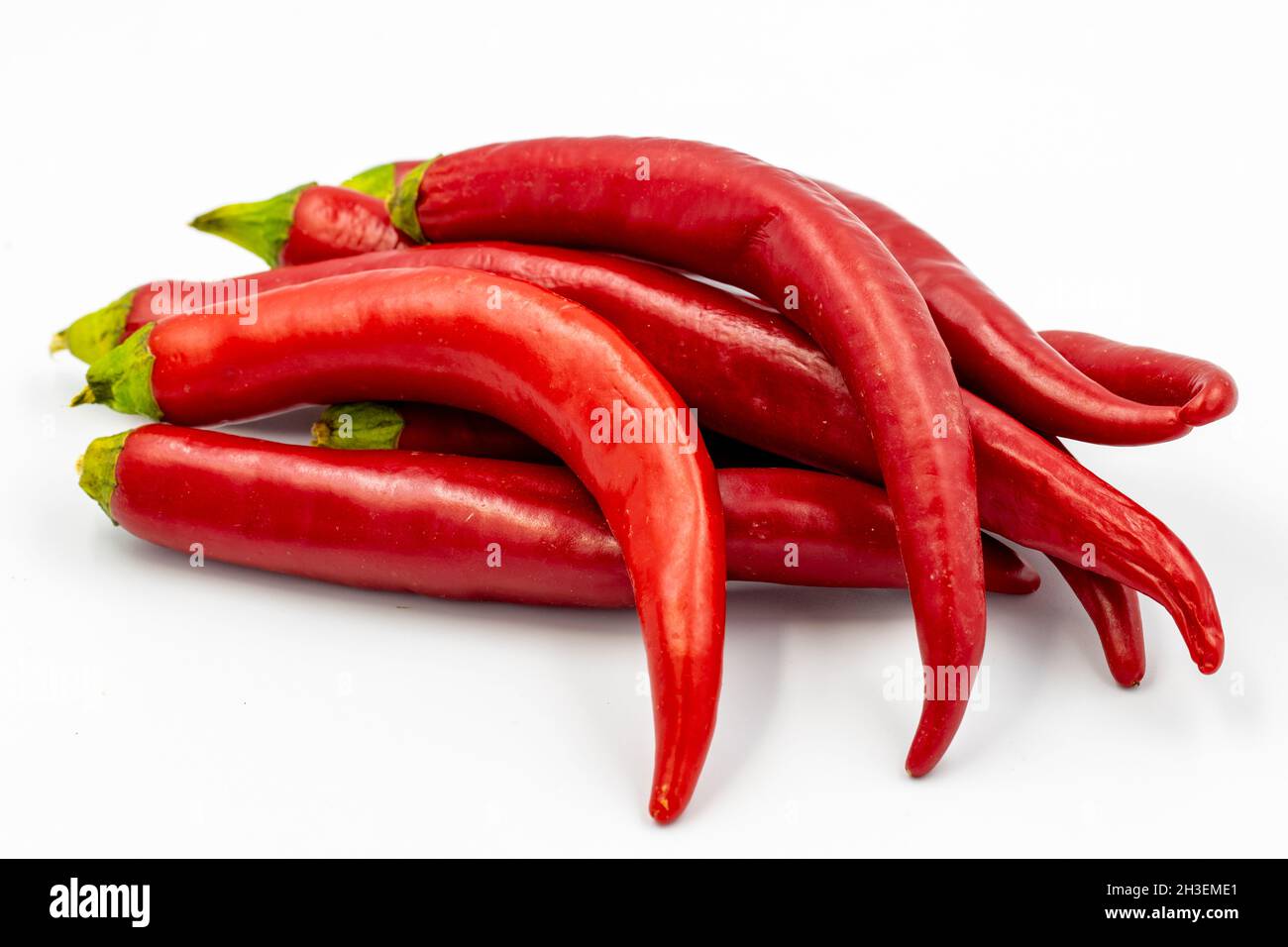 Red hot chili pepper on white background with shadow. close up Stock ...