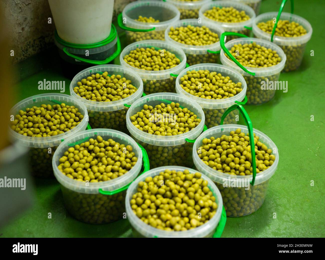 Ripe olives in plastic containers Stock Photo - Alamy