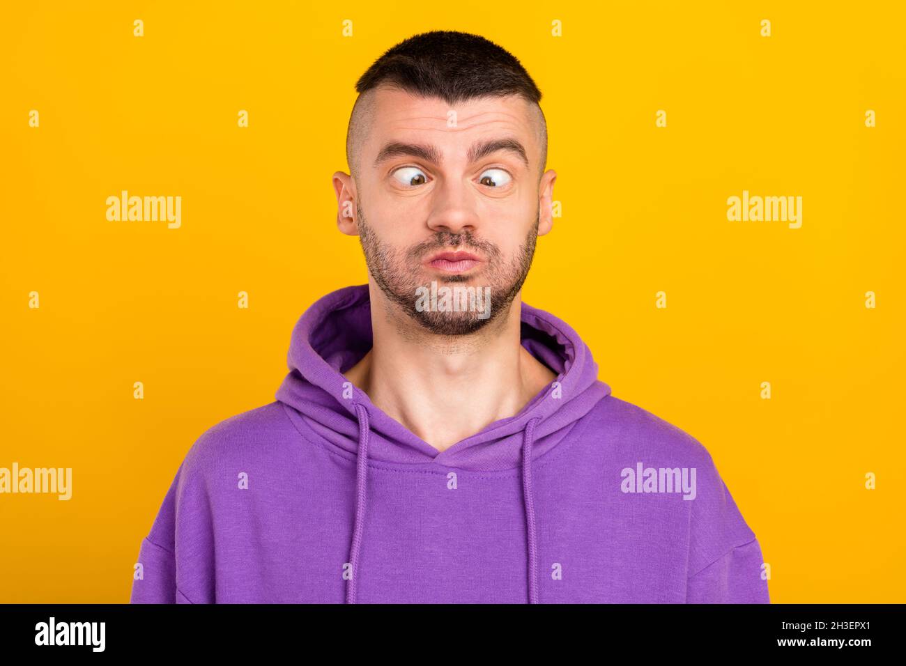 Portrait of attractive funny humorous crazy guy fooling grimacing ...