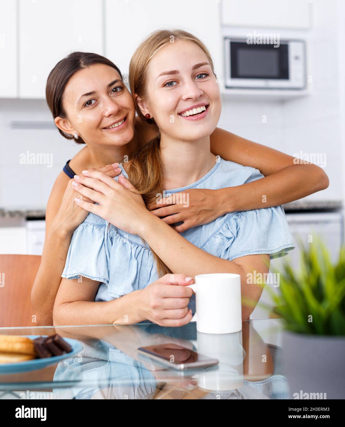 Girlfriends hugging hi-res stock photography and images - Alamy