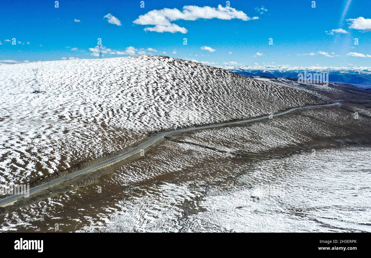 Garze. 24th Oct, 2021. Aerial photo taken on Oct. 24, 2021 shows a road ...