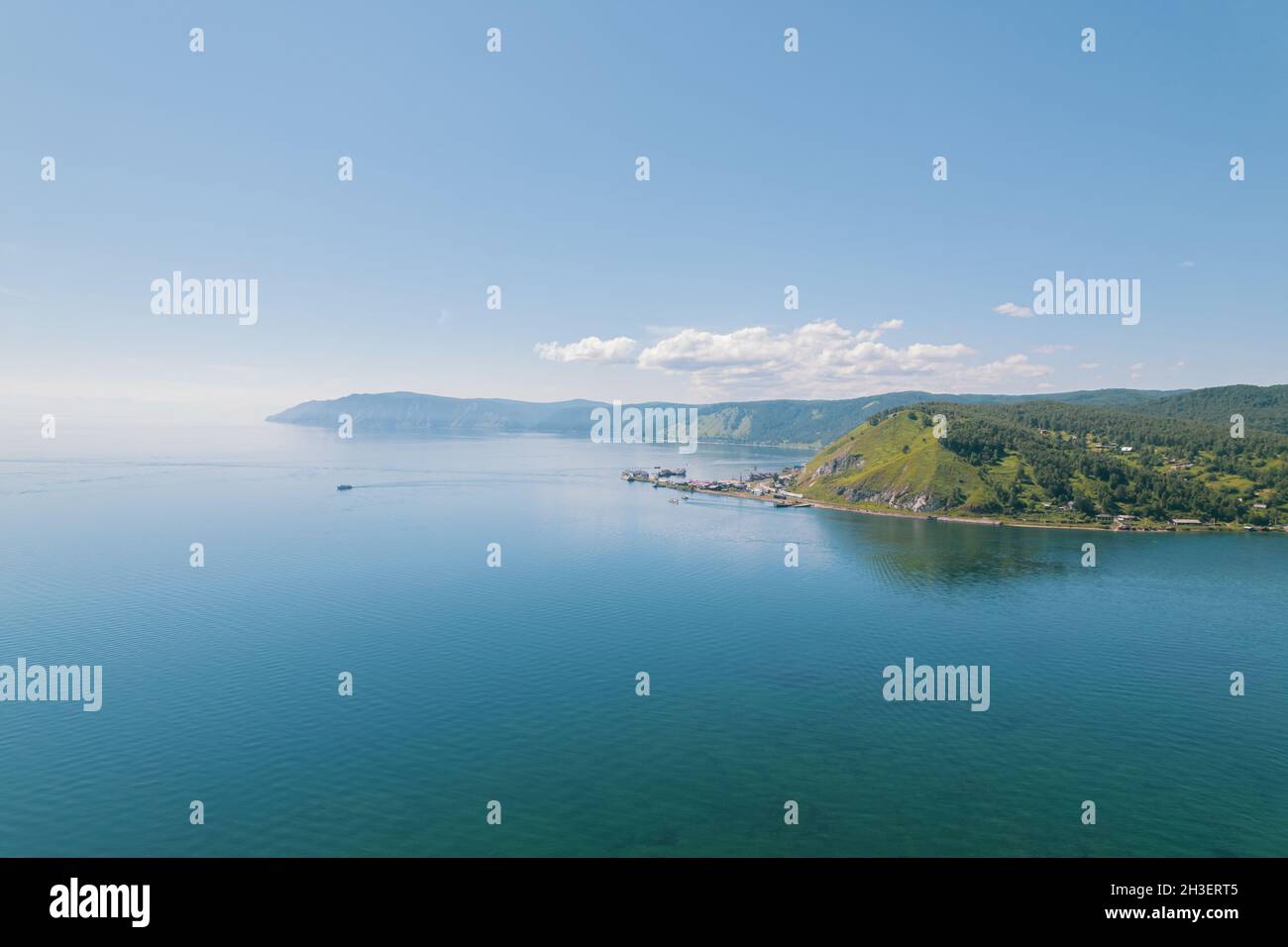 Lake Baikal is a marvelous blue jewel framed by scenic mountains and ...