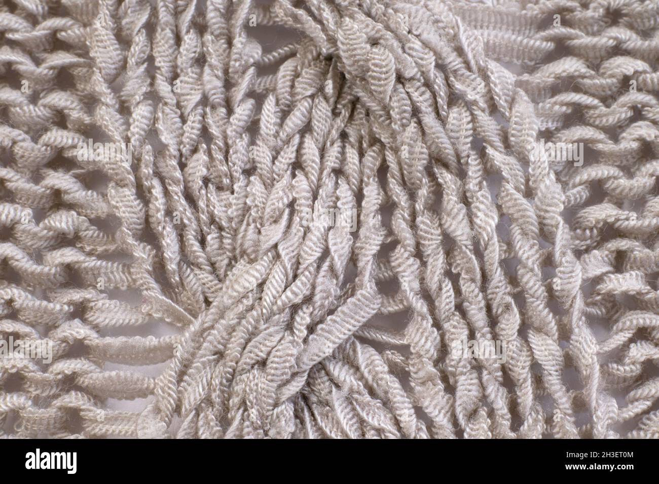 Soft light natural texture of knitted wool textile material background ...