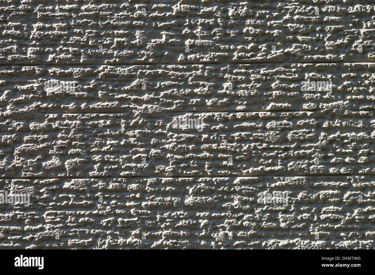 Texture of the building wall made of fine gray stone Stock Photo - Alamy