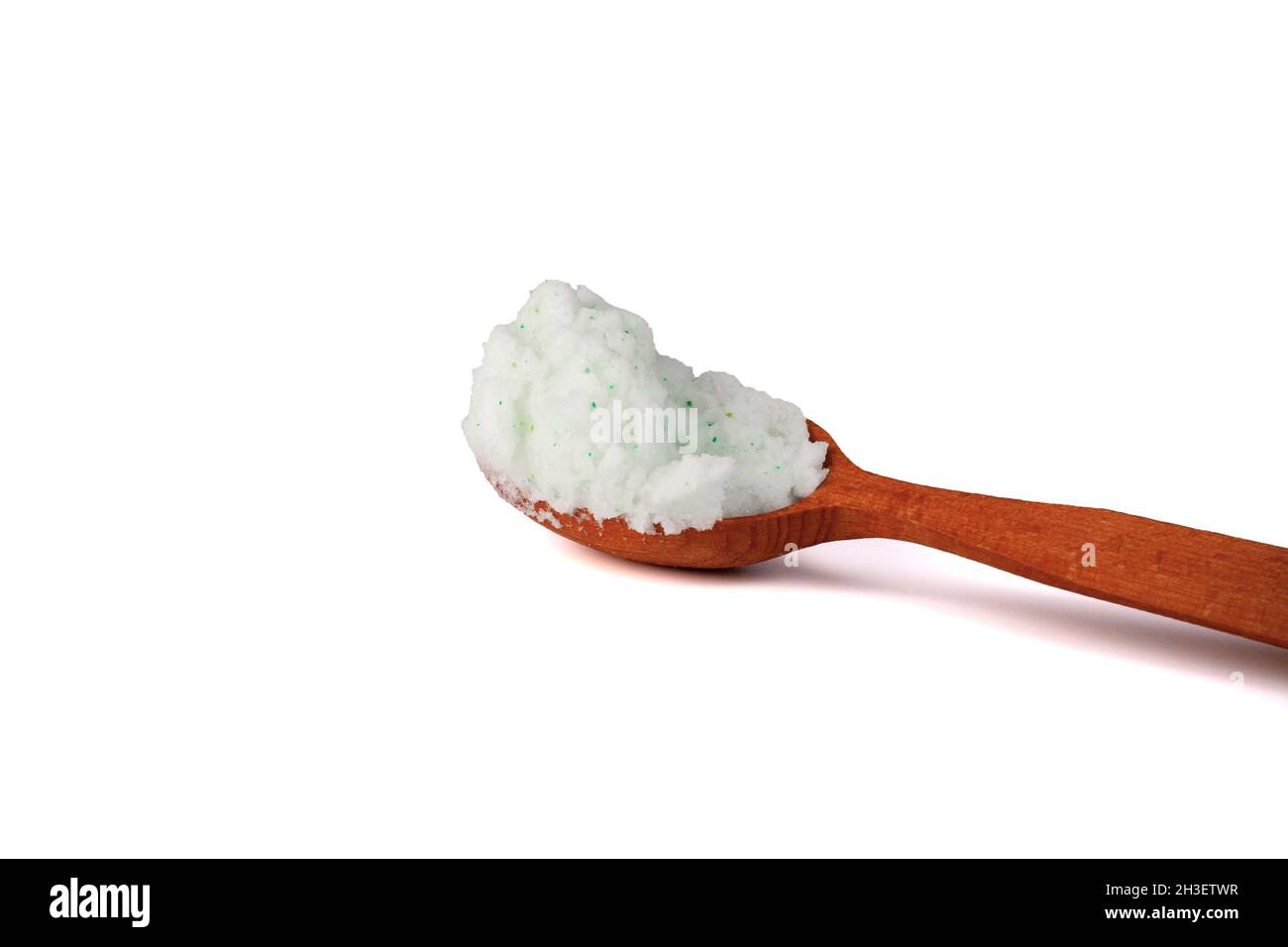 Body scrub with green crystals in wooden spoon. Homemade cosmetic for ...