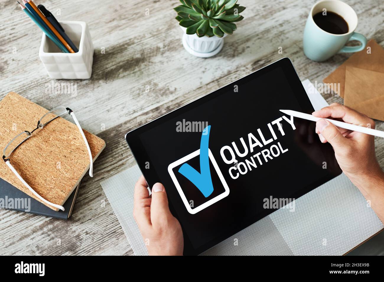 Quality control check box on device screen. Standards and certification ...
