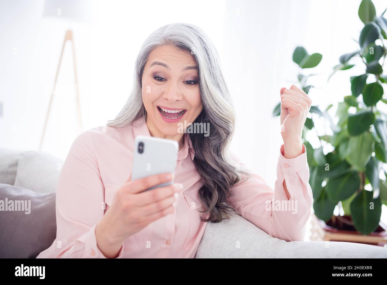 Photo of hooray long hairdo senior lady open mouth look telephone wear ...