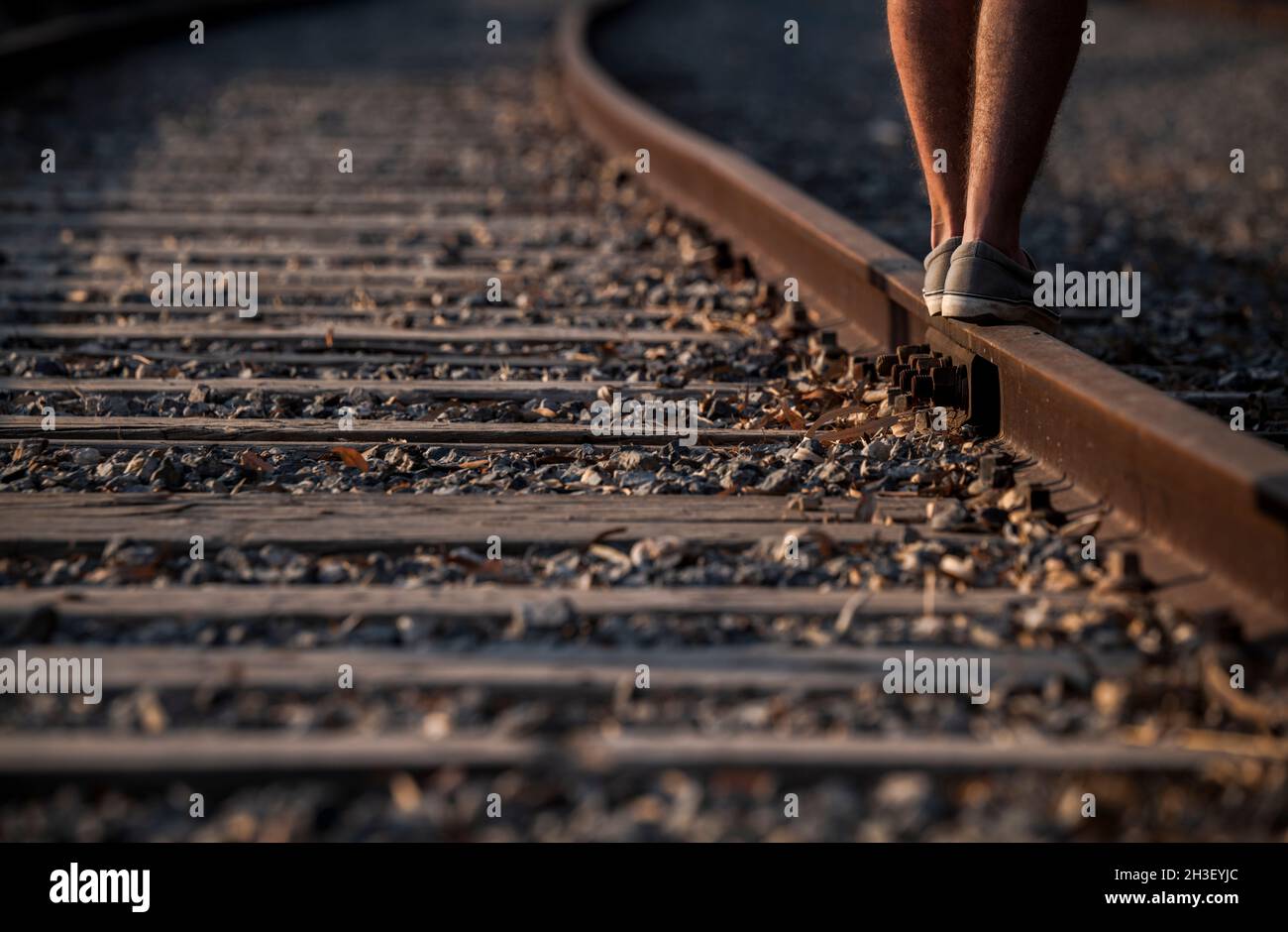 Man walking on rail track hi-res stock photography and images - Alamy