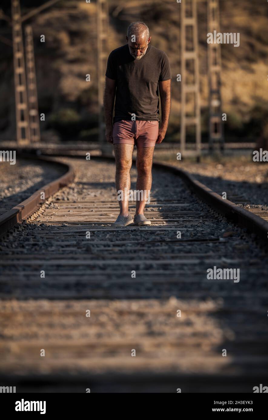 Man walking on rail track hi-res stock photography and images - Alamy