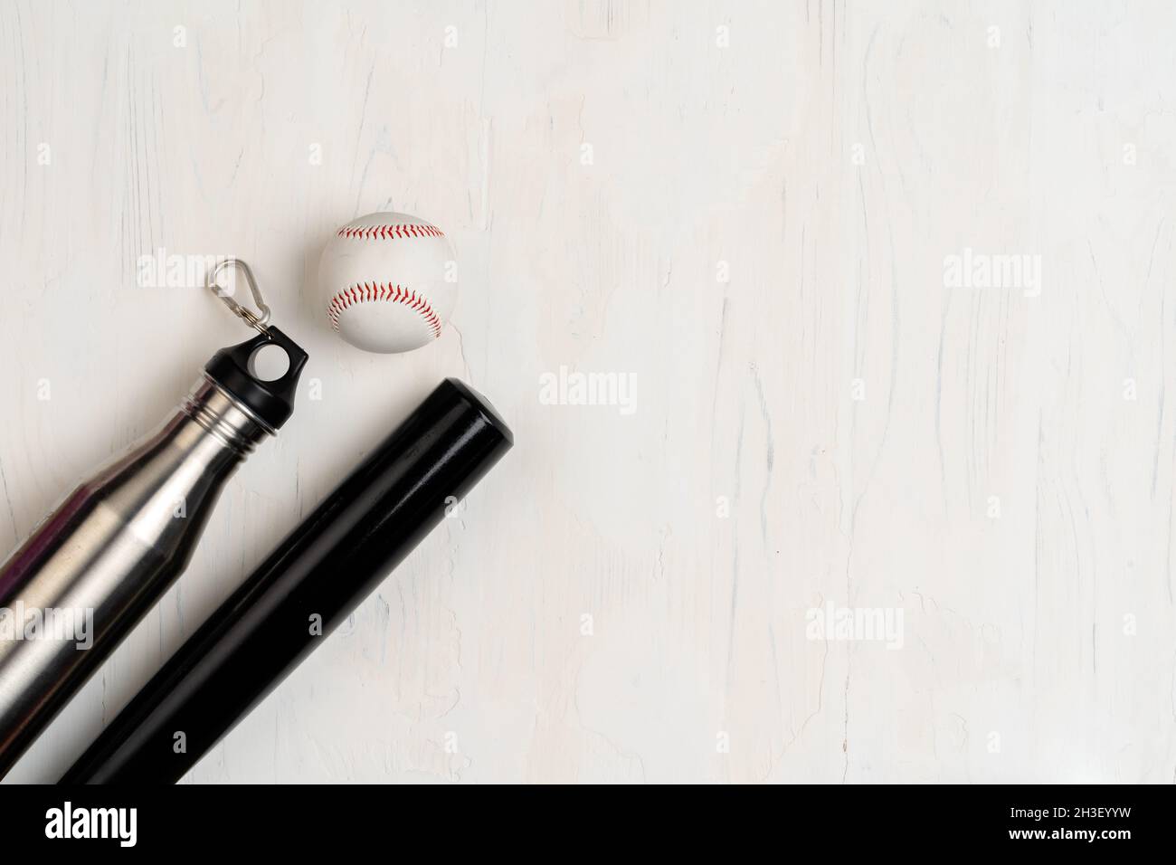 Baseball bat and ball, view from above Stock Photo - Alamy