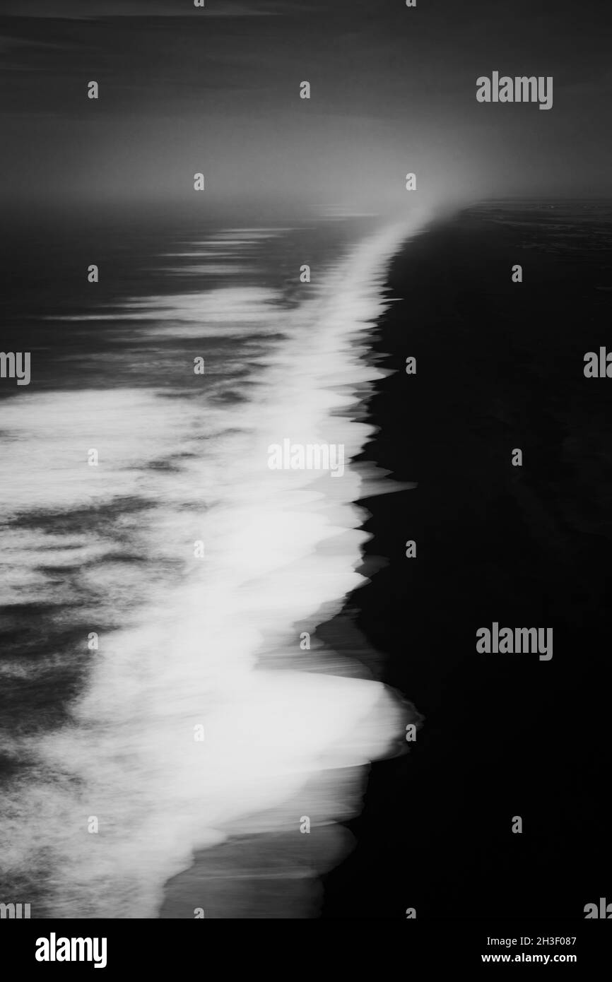 Endless black beach Black and White Stock Photos & Images - Alamy