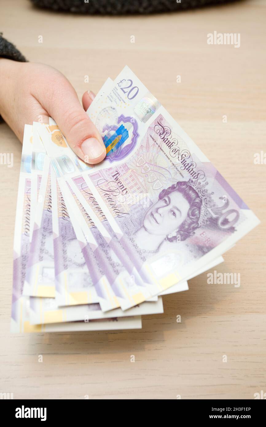 Hand banknote hi-res stock photography and images - Alamy