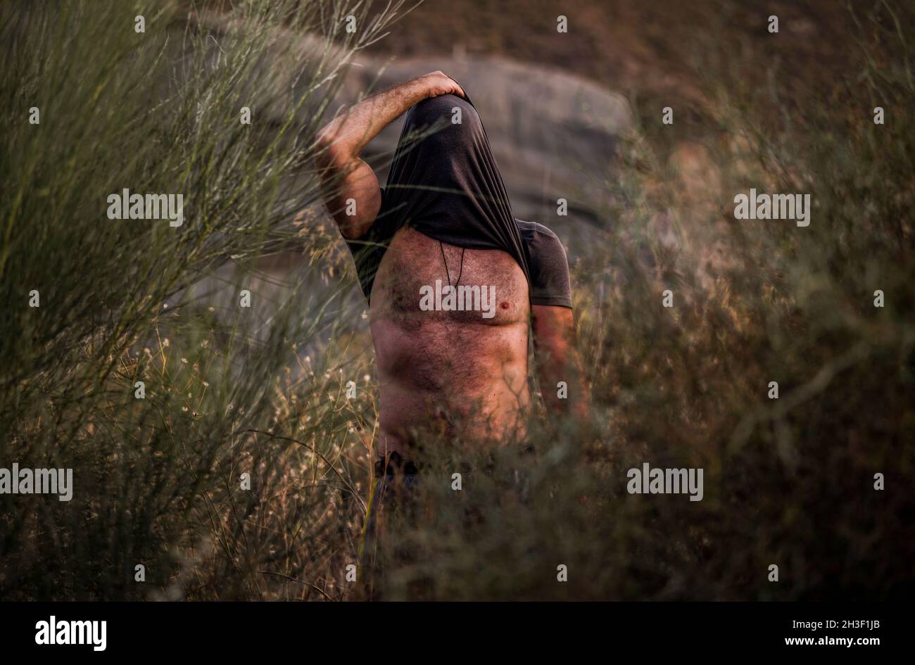 Covering head hi-res stock photography and images - Alamy