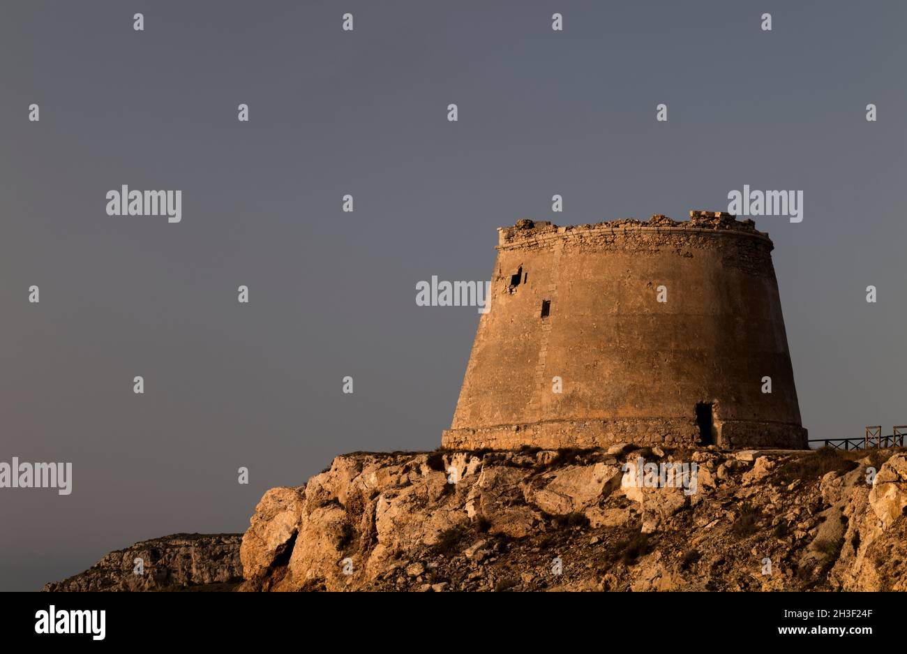 Castle-like building on coast against blue clear sky Stock Photo - Alamy
