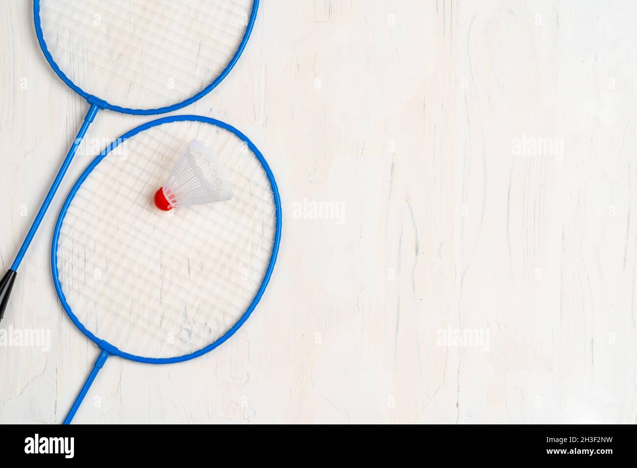 Badminton equipment. Rackets and shuttlecock, top view Stock Photo - Alamy