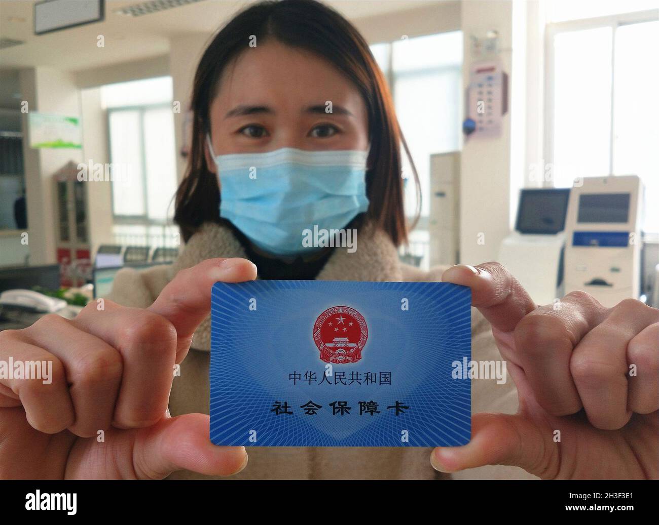 ZOUCHENG, CHINA - OCTOBER 28, 2021 - A citizen shows her social ...