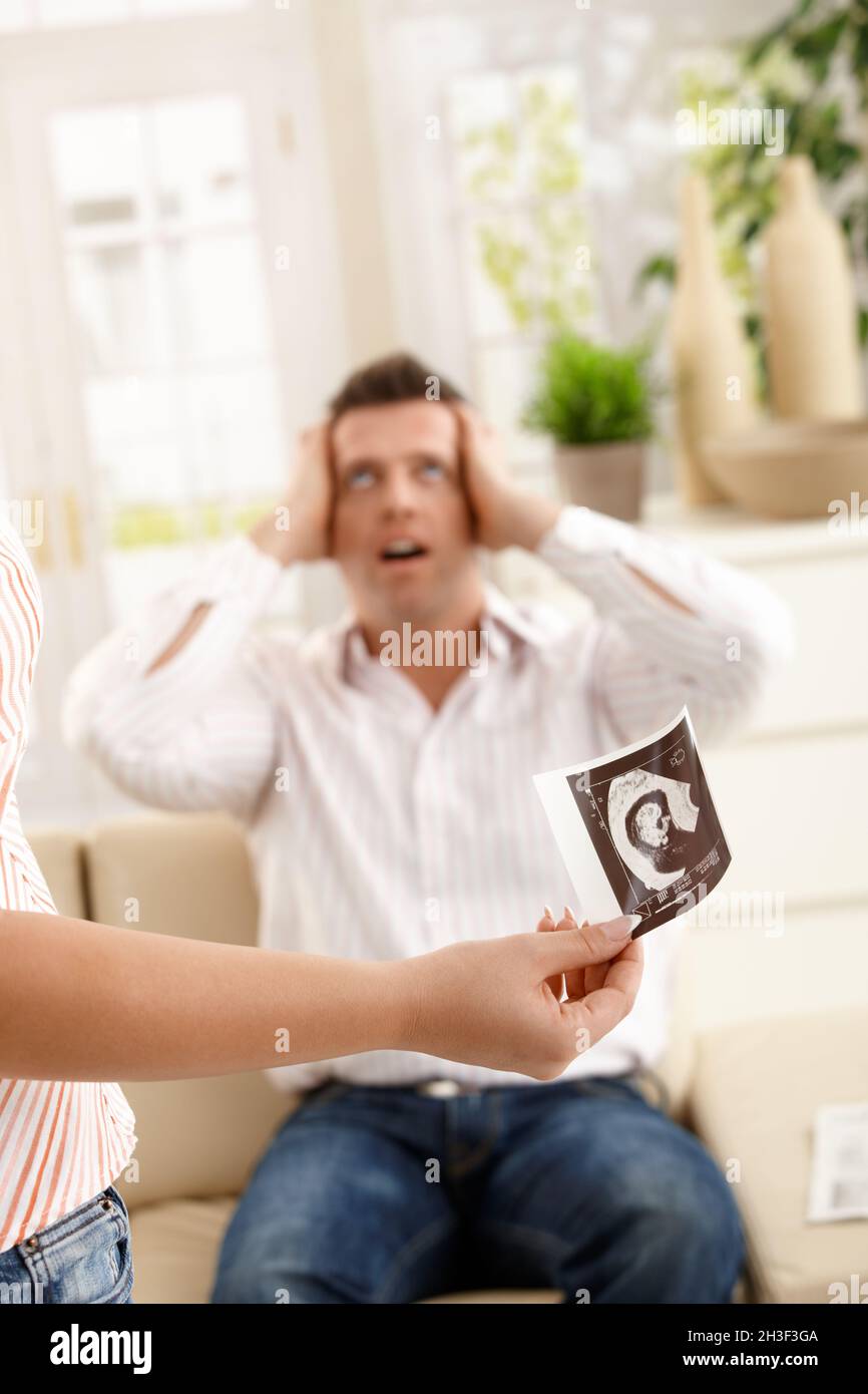 Father in shock of having baby Stock Photo - Alamy