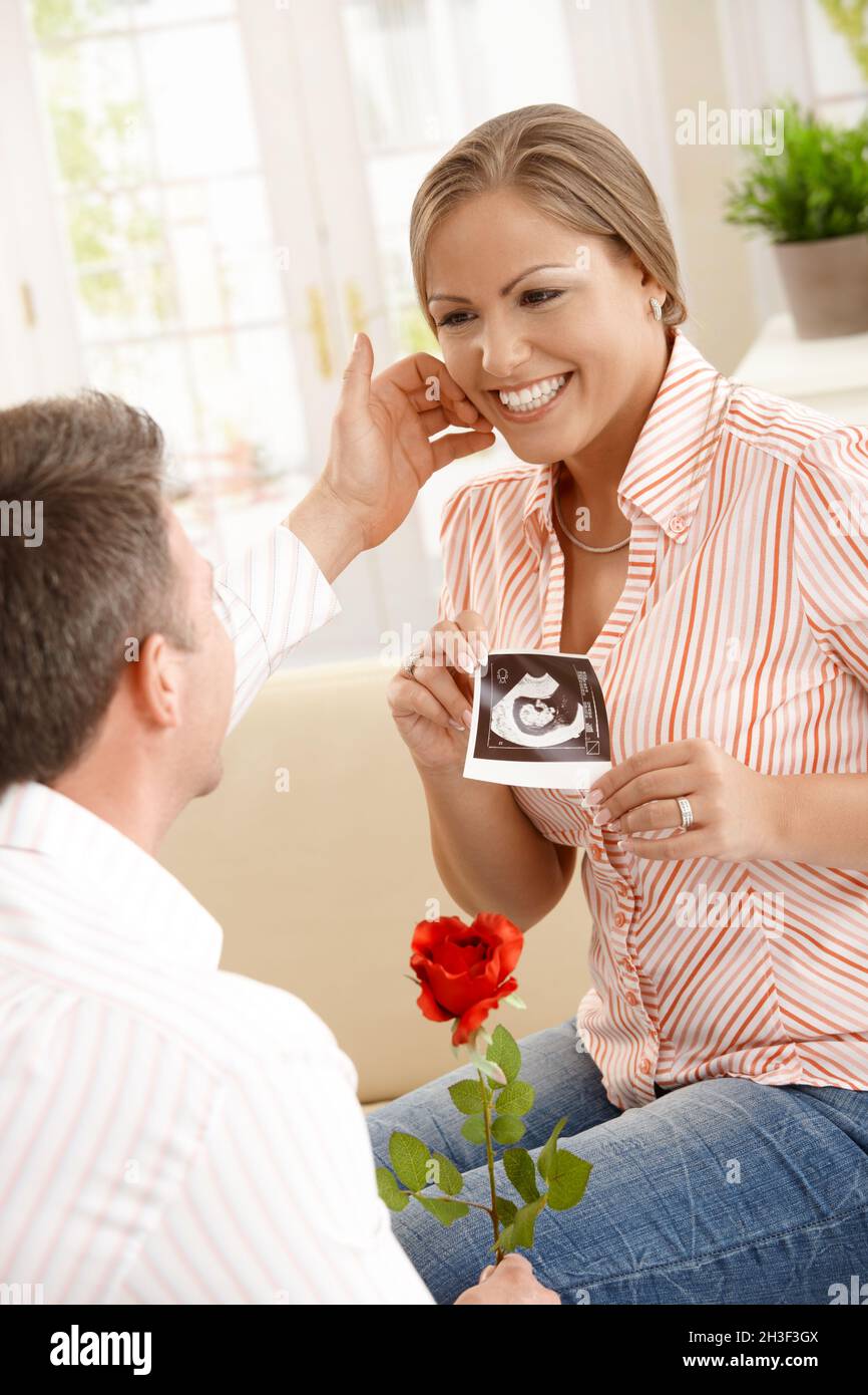 Happy couple expecting baby Stock Photo - Alamy