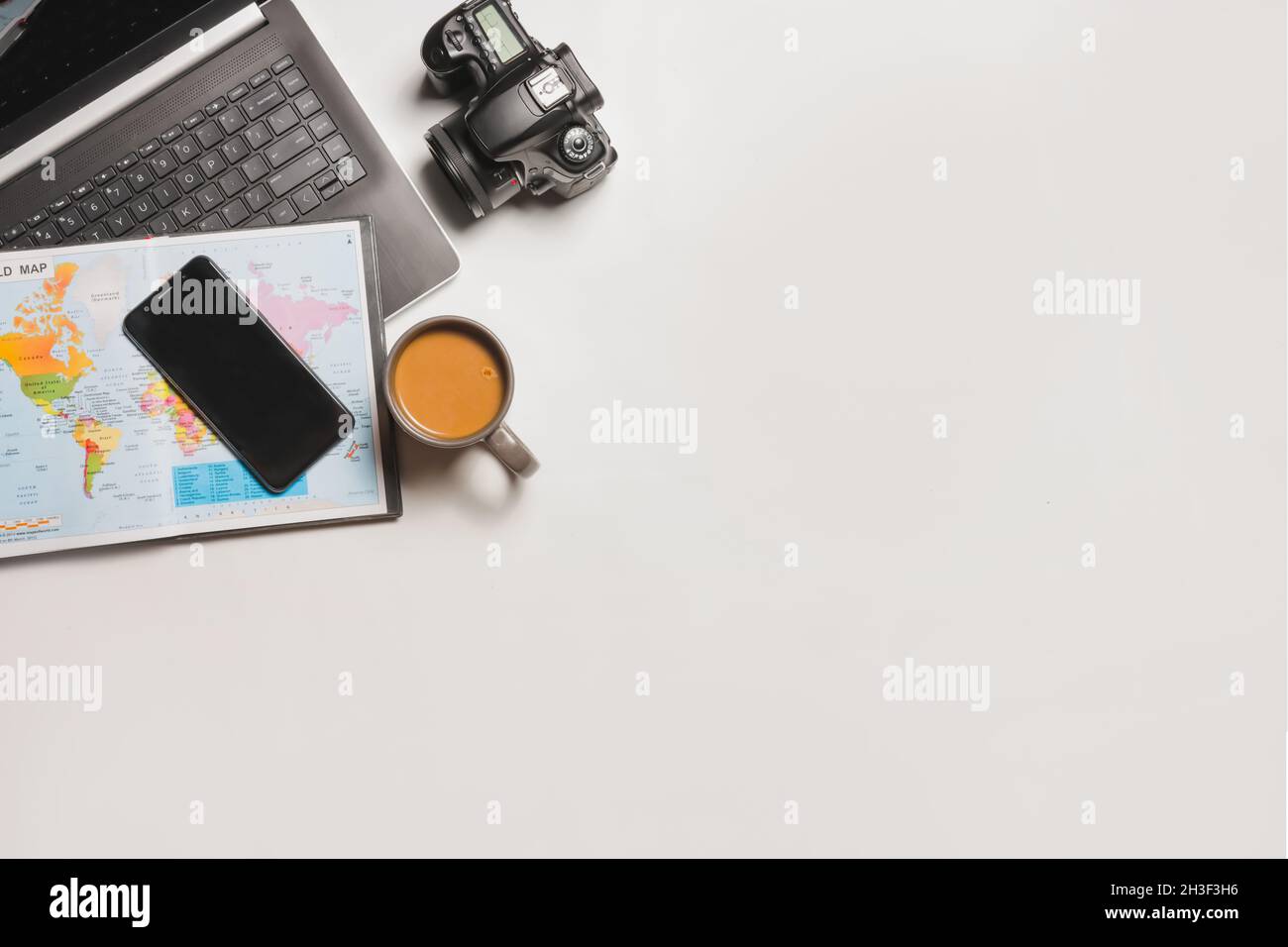 flat lay, world map, camera and coffee Stock Photo - Alamy
